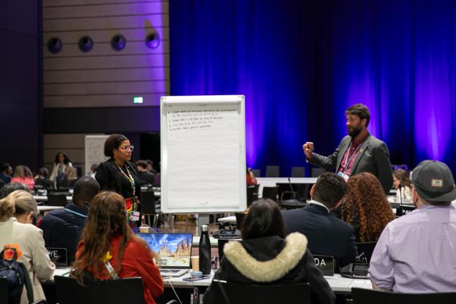 Delegates break out into groups to showcase and exchange information on ...