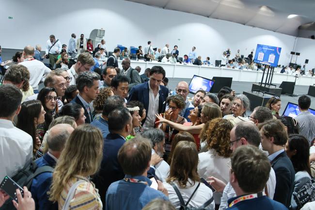Delegates huddle during the Mutirão Mobilization for the Belém Package ...